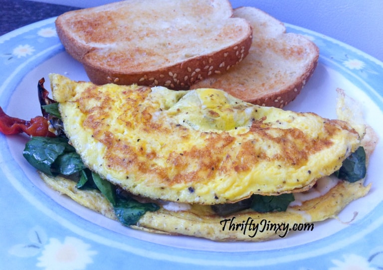 Greek Omelet Recipe with Spinach, Peppers and Feta - Thrifty Jinxy