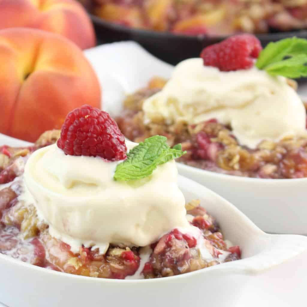 Skillet Peach Raspberry Crisp Recipe - Thrifty Jinxy