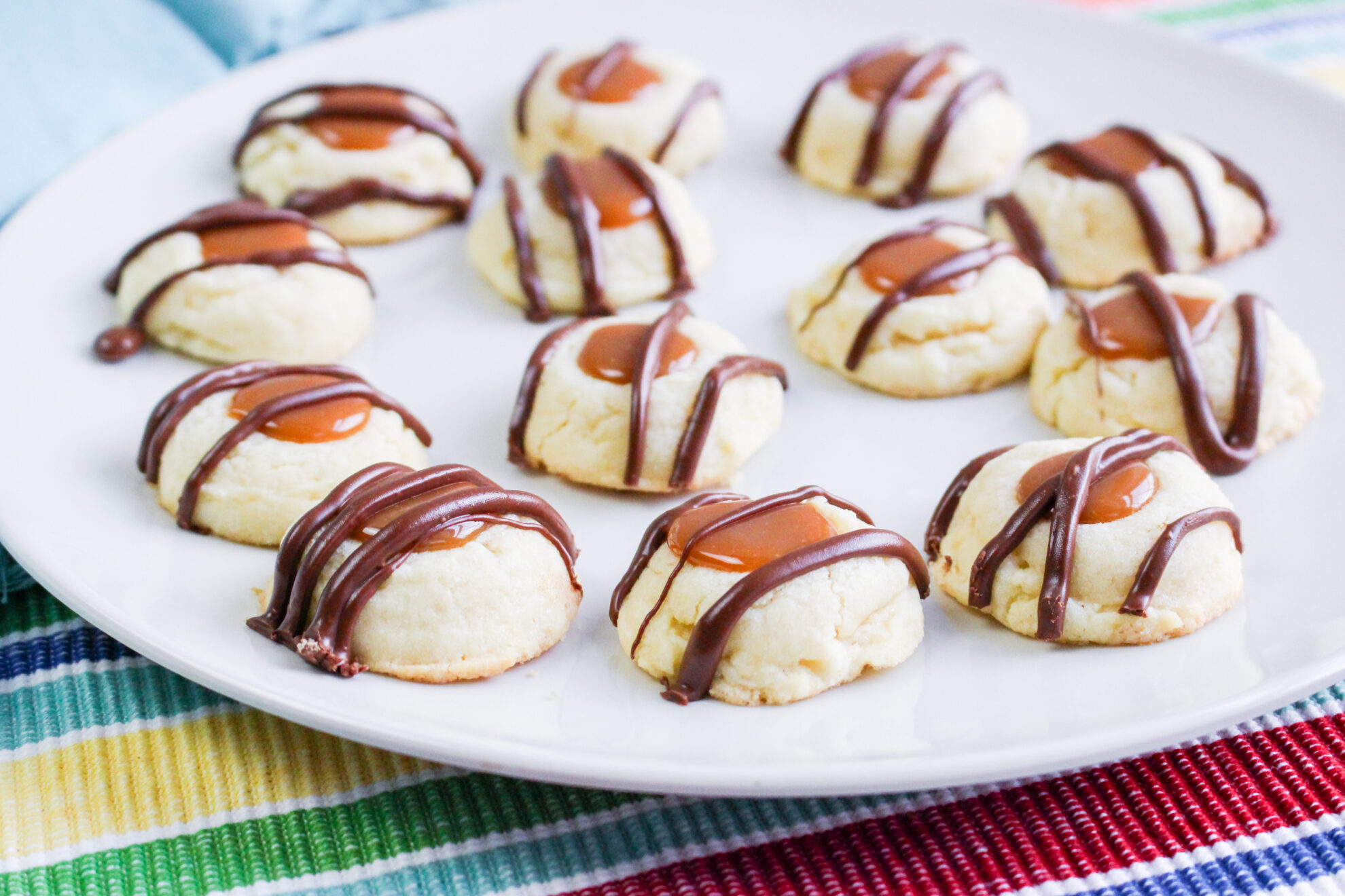 Twix Thumbprint Cookies - Thrifty Jinxy