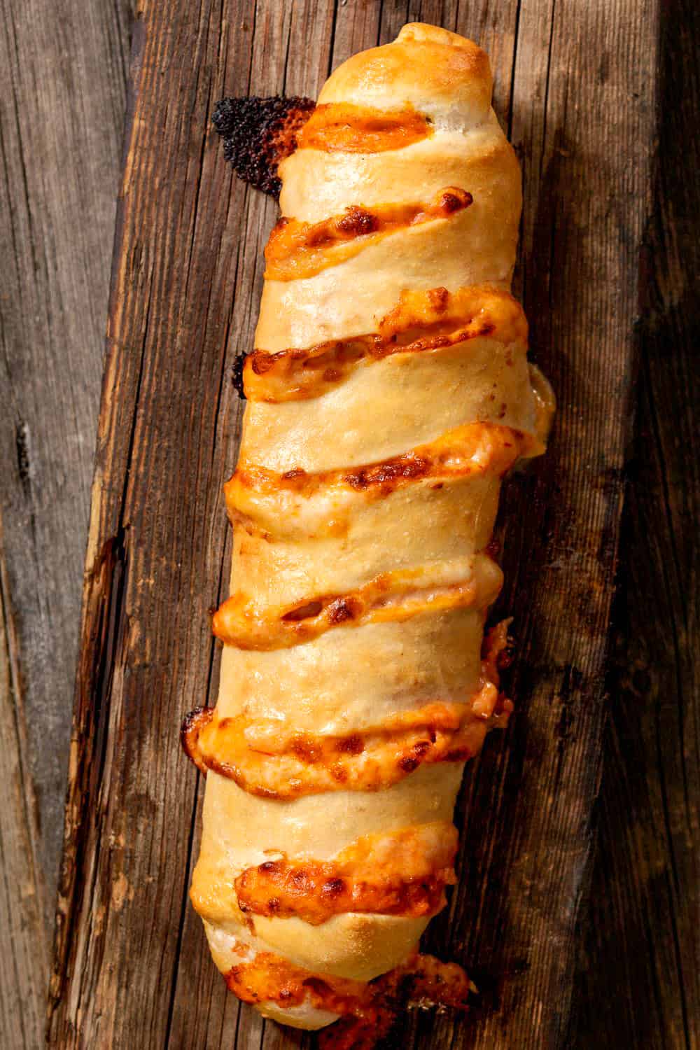 Easy Pepperoni Stromboli Recipe with Ham and Cheese - Thrifty Jinxy