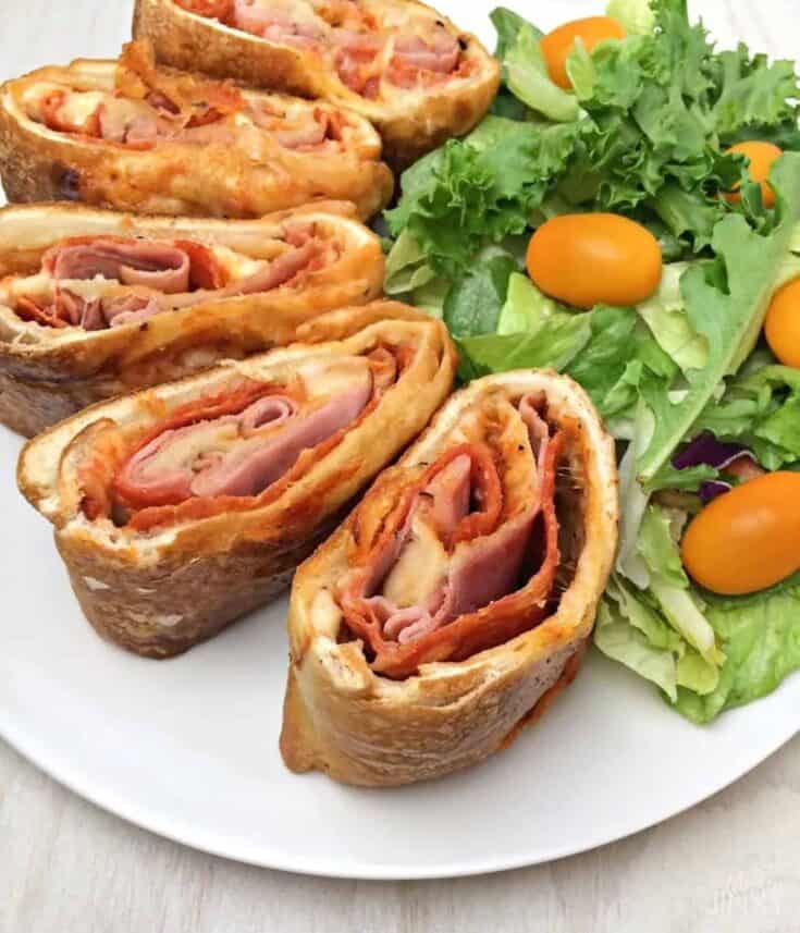 Easy Pepperoni Stromboli Recipe with Ham and Cheese - Thrifty Jinxy